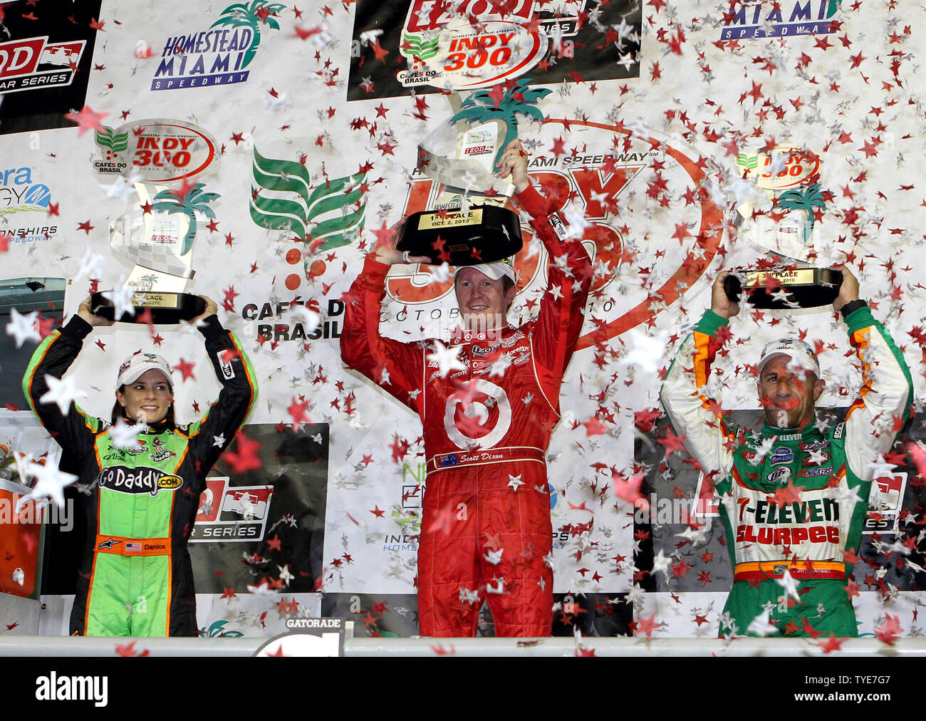 Scott Dixon (C) celebrates winning the IRL Cafe do Brasil Indy 300 at ...