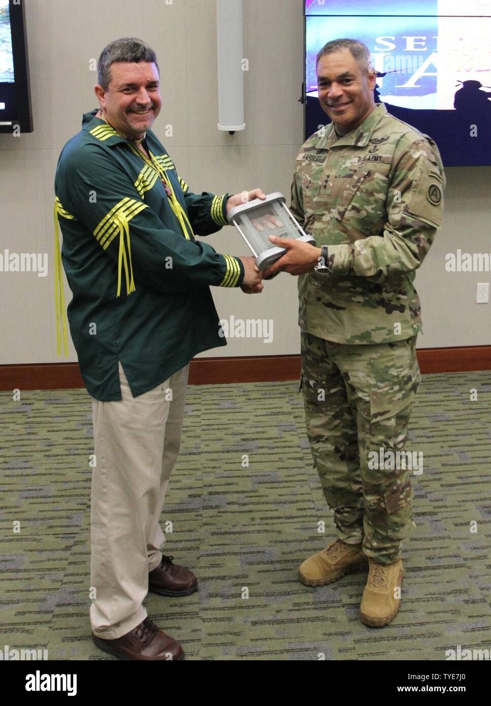 Lt. Gen. Michael Garrett, U.S. Army Central, commanding general (right ...