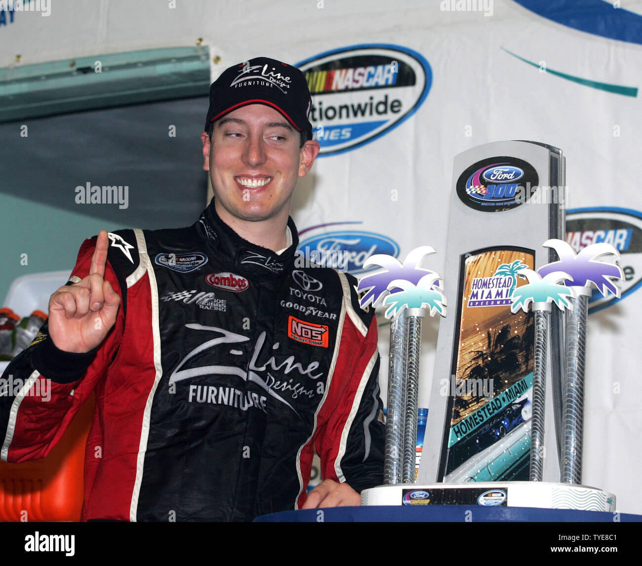 Kyle Busch celebrates winning the NASCAR Nationwide series Ford 300 at ...
