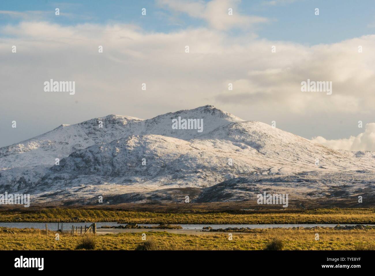 Snow topped Beinn Mhor, South Uist, Outer Hebrides Scotland UK with ...