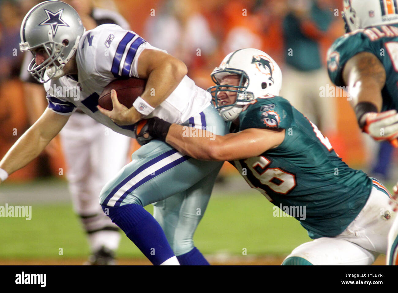 Dallas Cowboys quarterback Stephen McGhee (7) is sacked by Miami ...