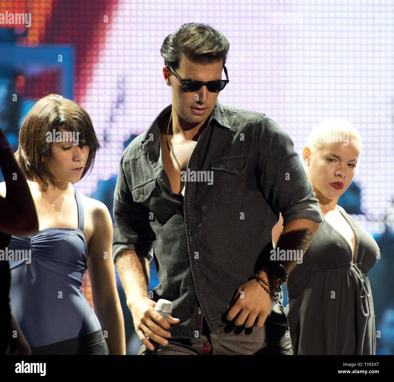 Latin singer Jencarlos Canela rehearses for the 2012 Premios Tu Mundo ...