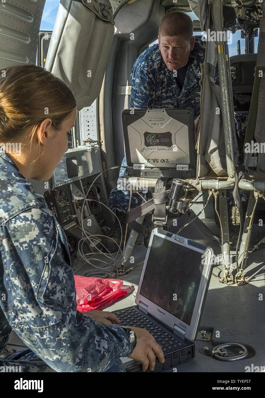 Petty Officer 3rd Class Angela Bobst and Petty Officer 2nd Class Ryan ...