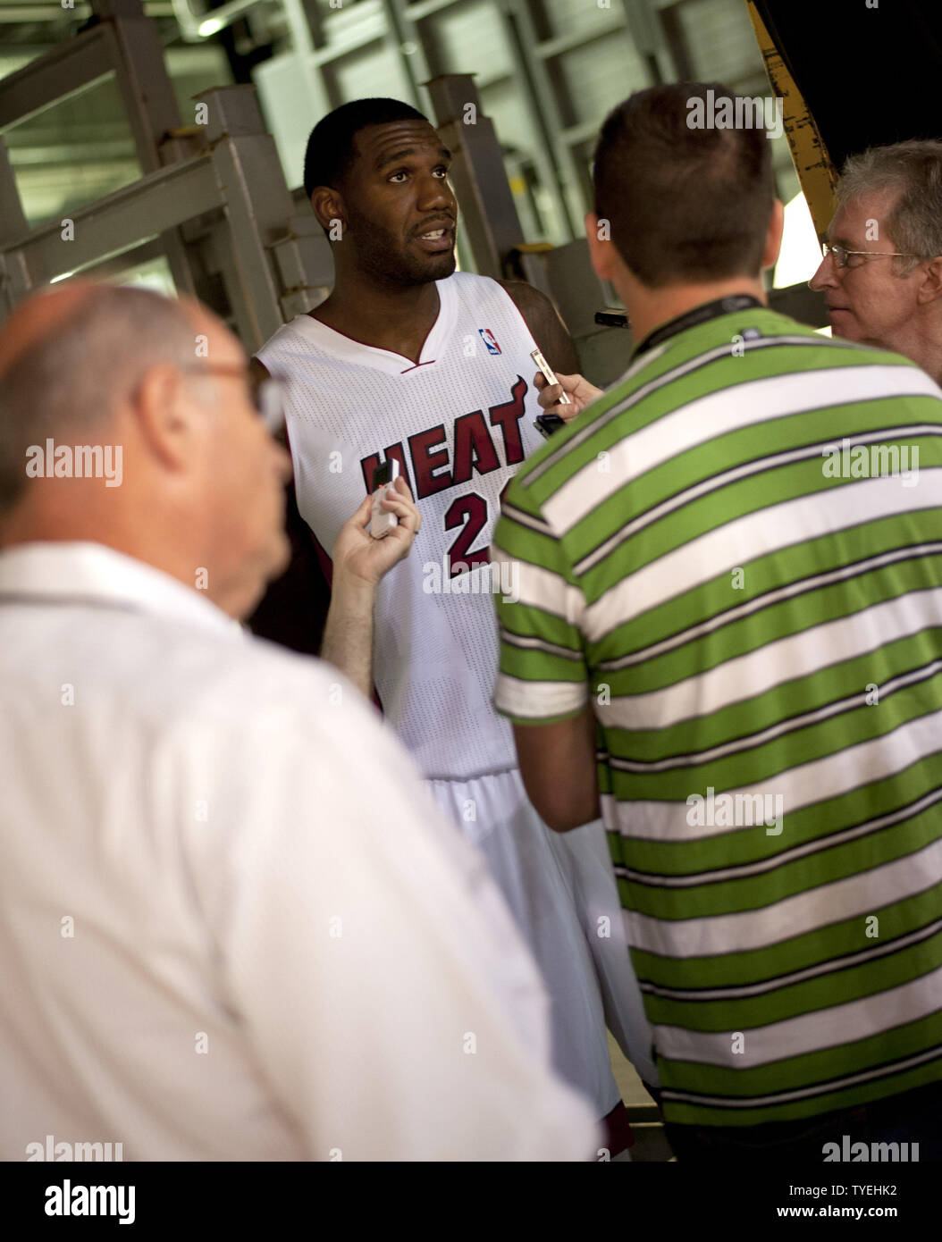 Miami Heat's Greg Oden (20) talks to a reporter during the team's media ...