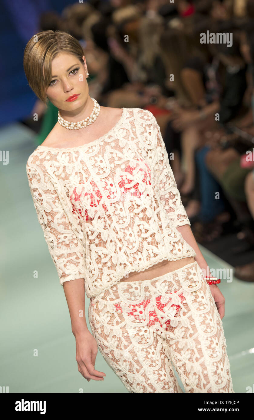 A model from Erin Healy fashions walks on the runway at the Miami Beach ...