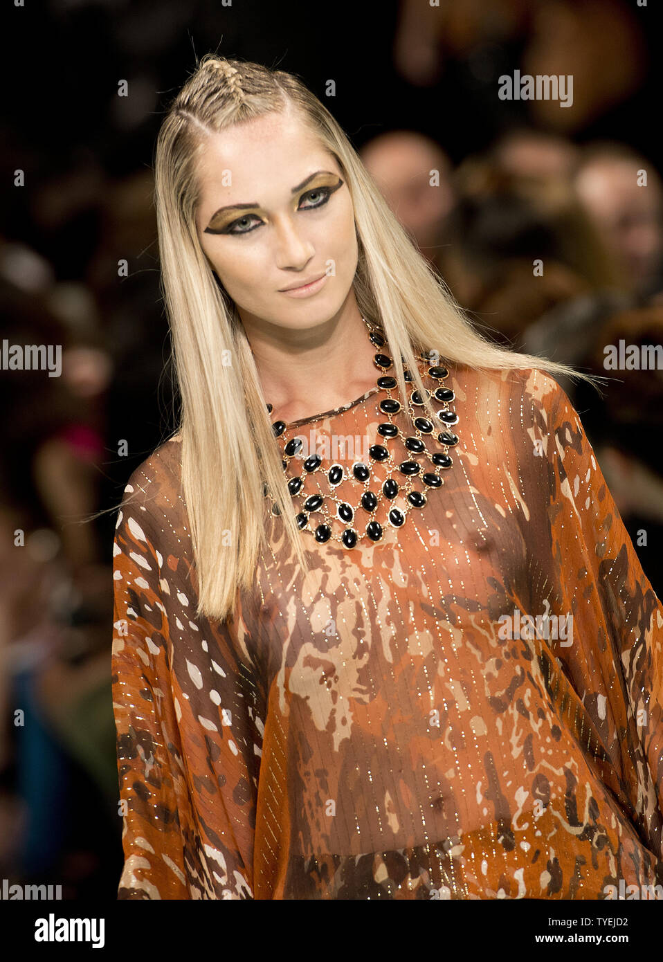 A model from Fabrizio de Castro fashions walks on the runway at the ...