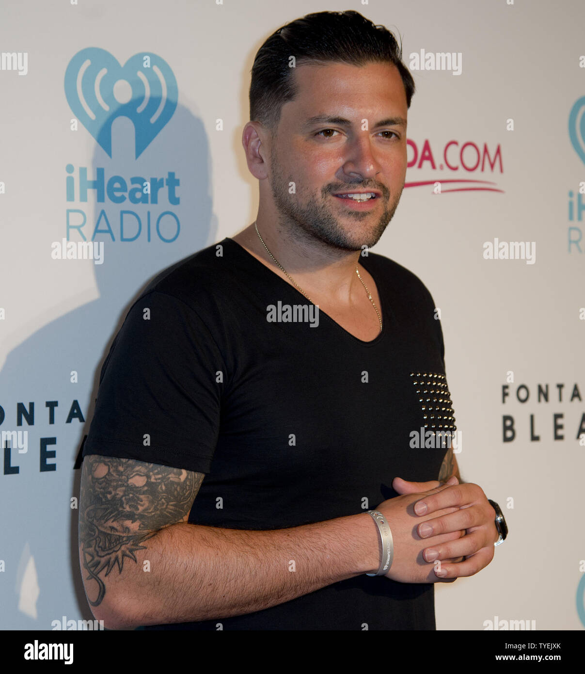 Performer DJ Prostyle walks the red carpet at the Third Annual ...