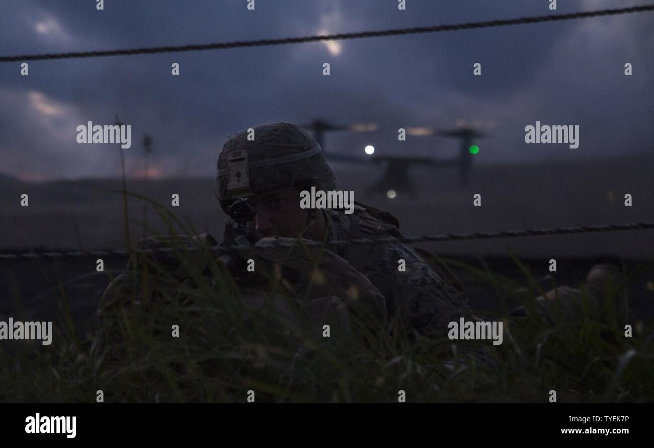 Cpl. Travis Blanton provides security for the incoming MV-22B Osprey ...