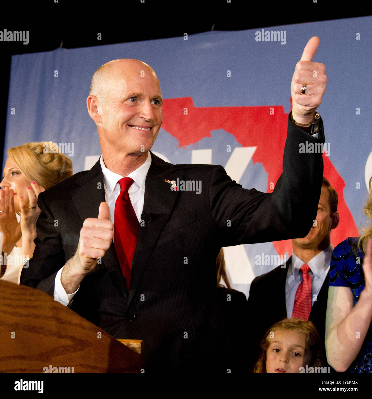 Florida Governor Rick Scott (Rep) gives two thumbs up to supporters ...