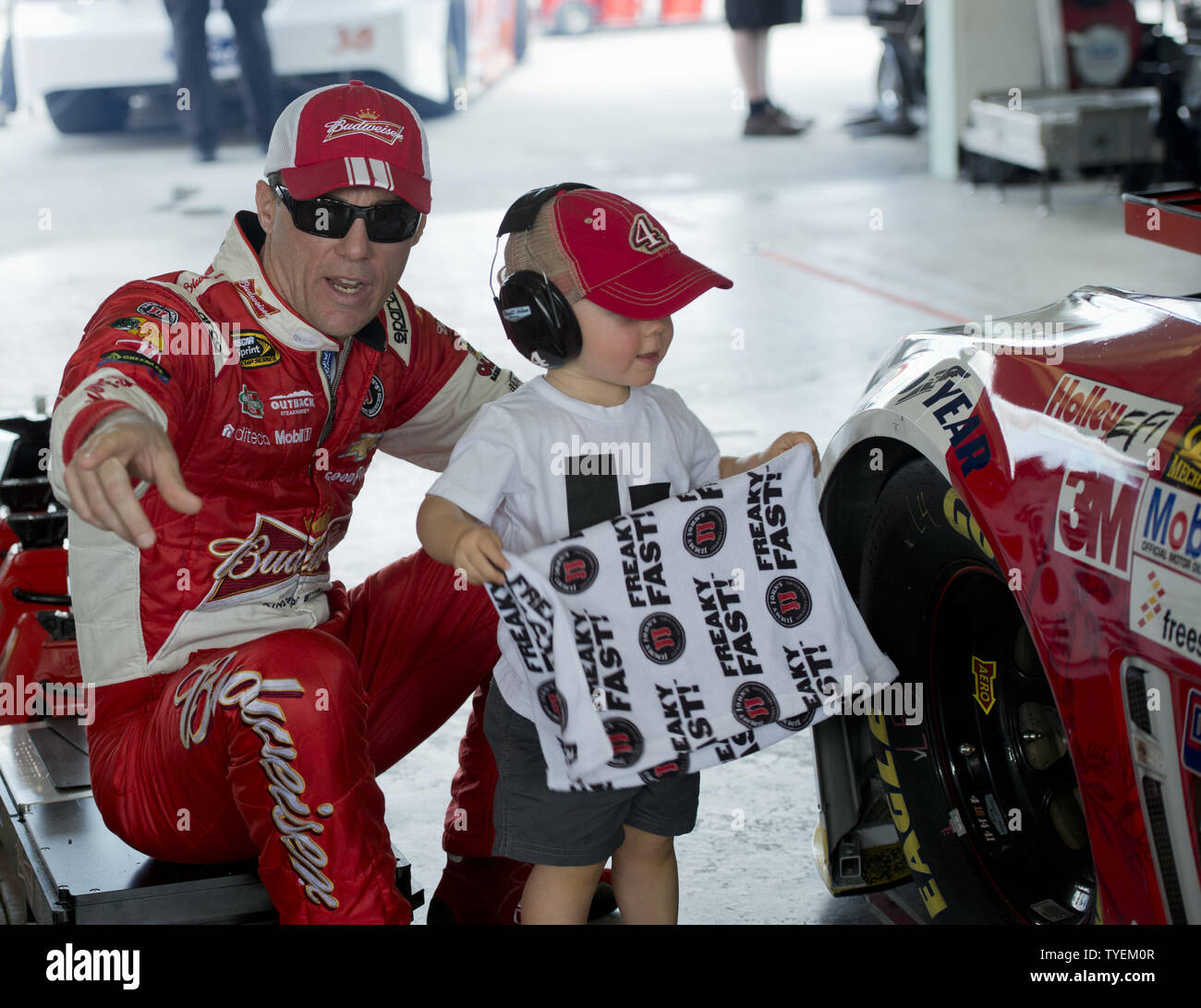NASCAR Spring Cup Series driver Kevin Harvick in car 4 watches his son ...