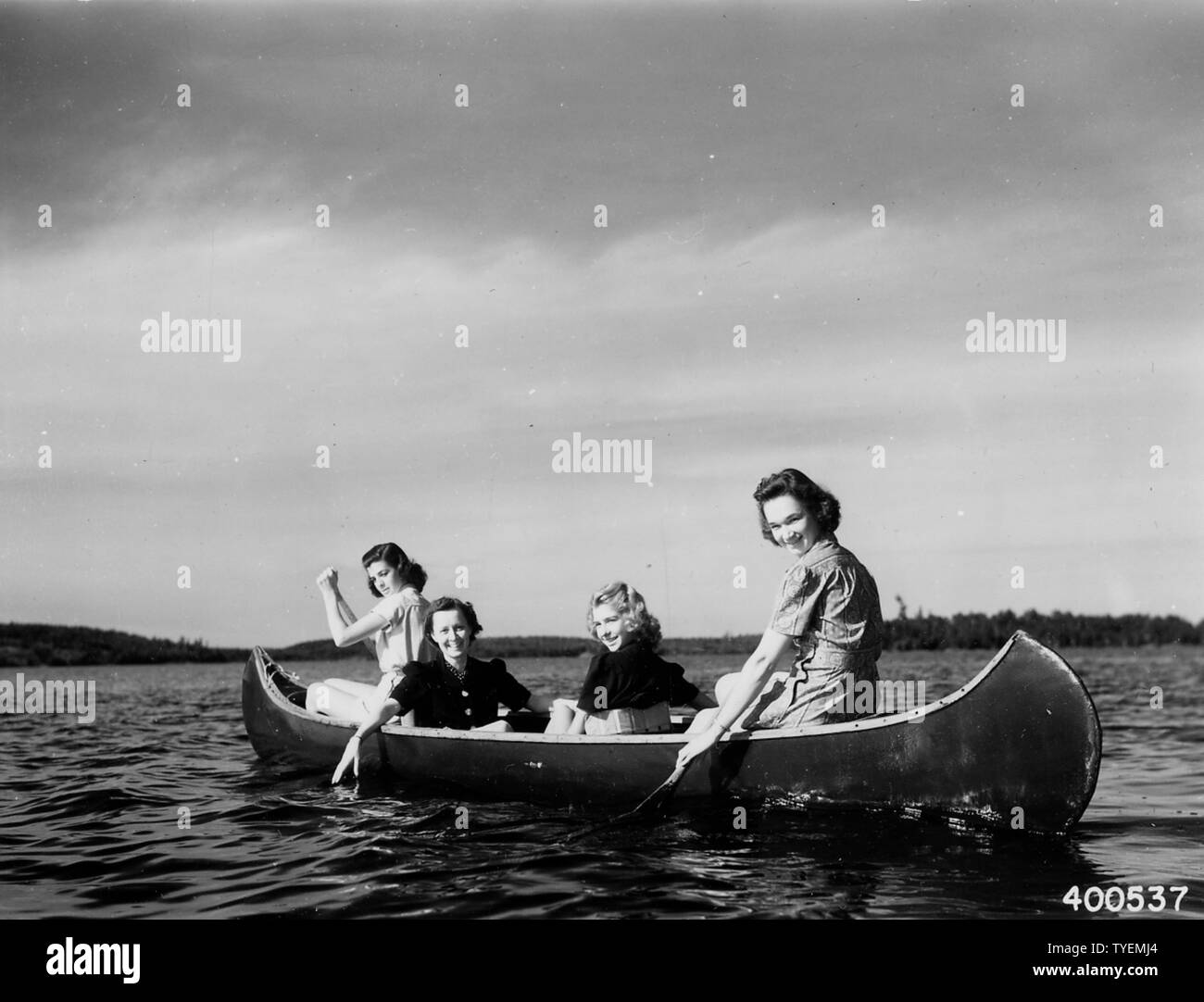 Photograph of a Party of Four Girls Canoeing; Scope and content ...