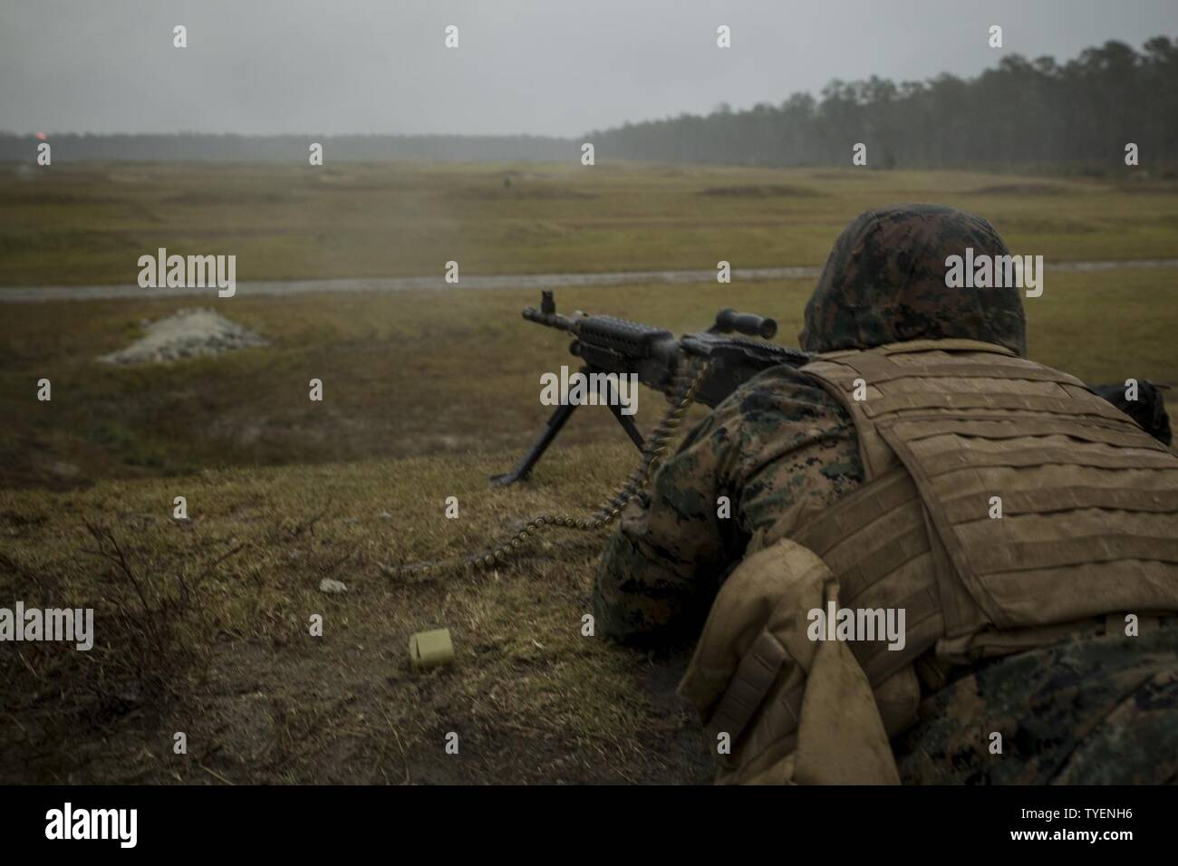 Lance Cpl. Juan Medellin fires the M240B medium machine gun during a ...