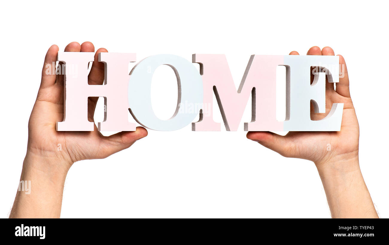 Hands holding Home word Stock Photo - Alamy