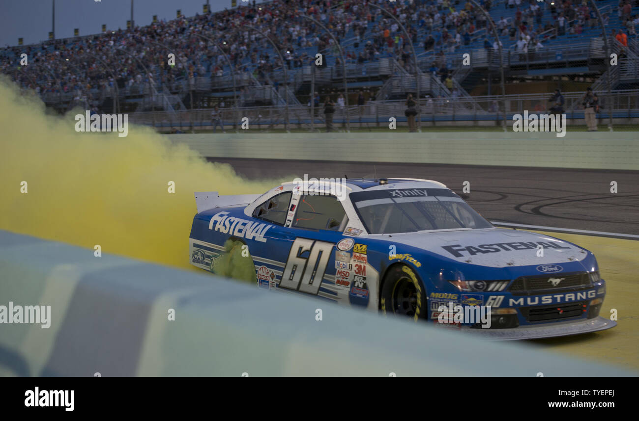 NASCAR Xfinity Series racer Chris Buescher (60) celebrates with his ...