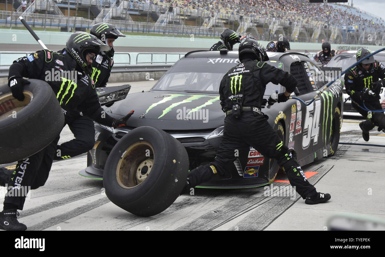 NASCAR Xfinity Series racer Kyle Busch (54) makes a pit stop at the ...