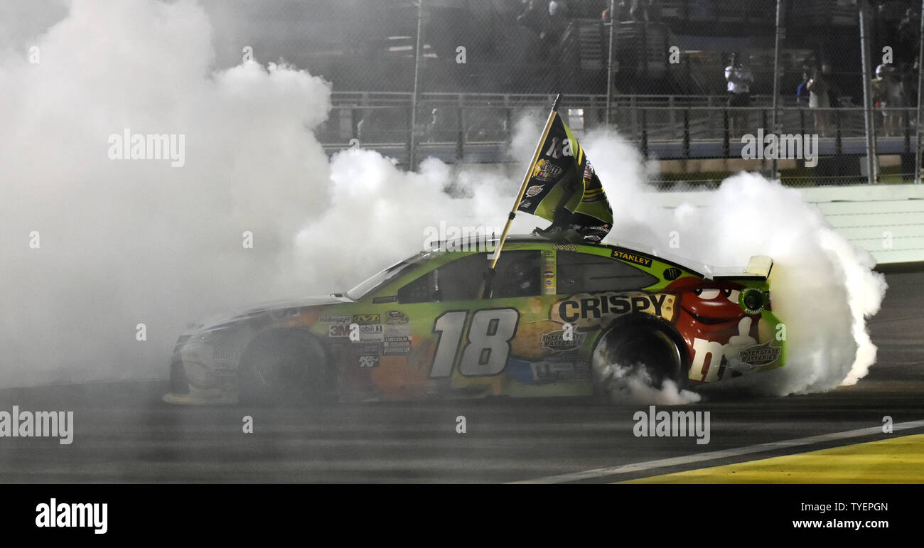 NASCAR Nationwide racer Kyle Busch (18) starts his burnout after ...