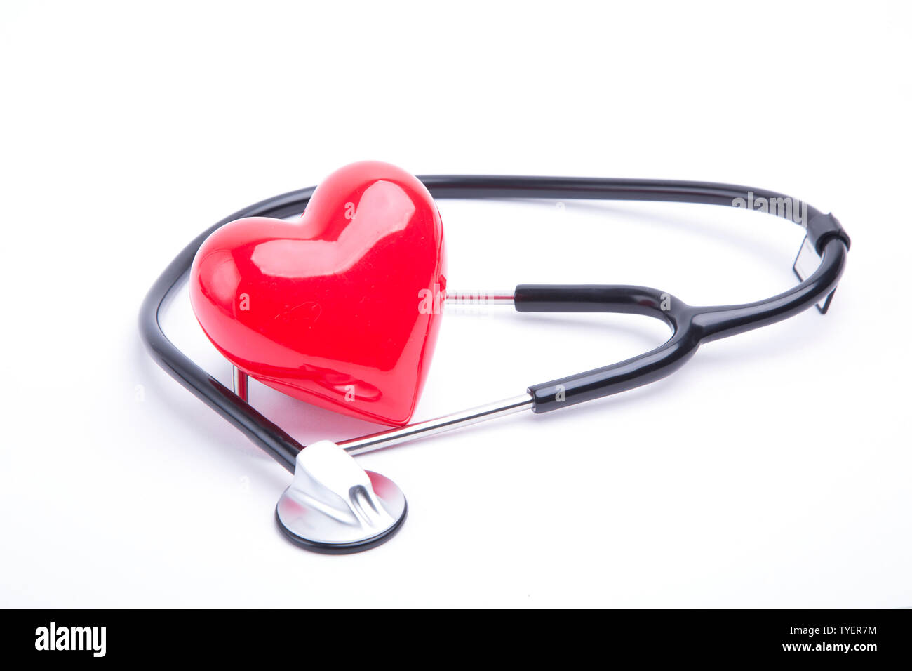 Red love and stethoscope on table Stock Photo - Alamy