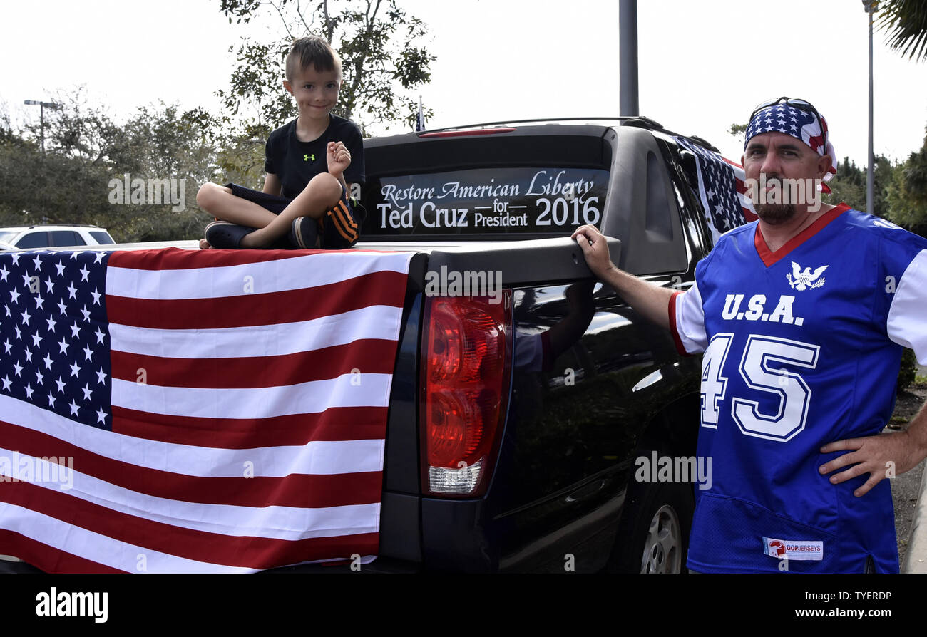 Sean Inman and his son Noah,6, stands at his truck in DelRay Beach ...