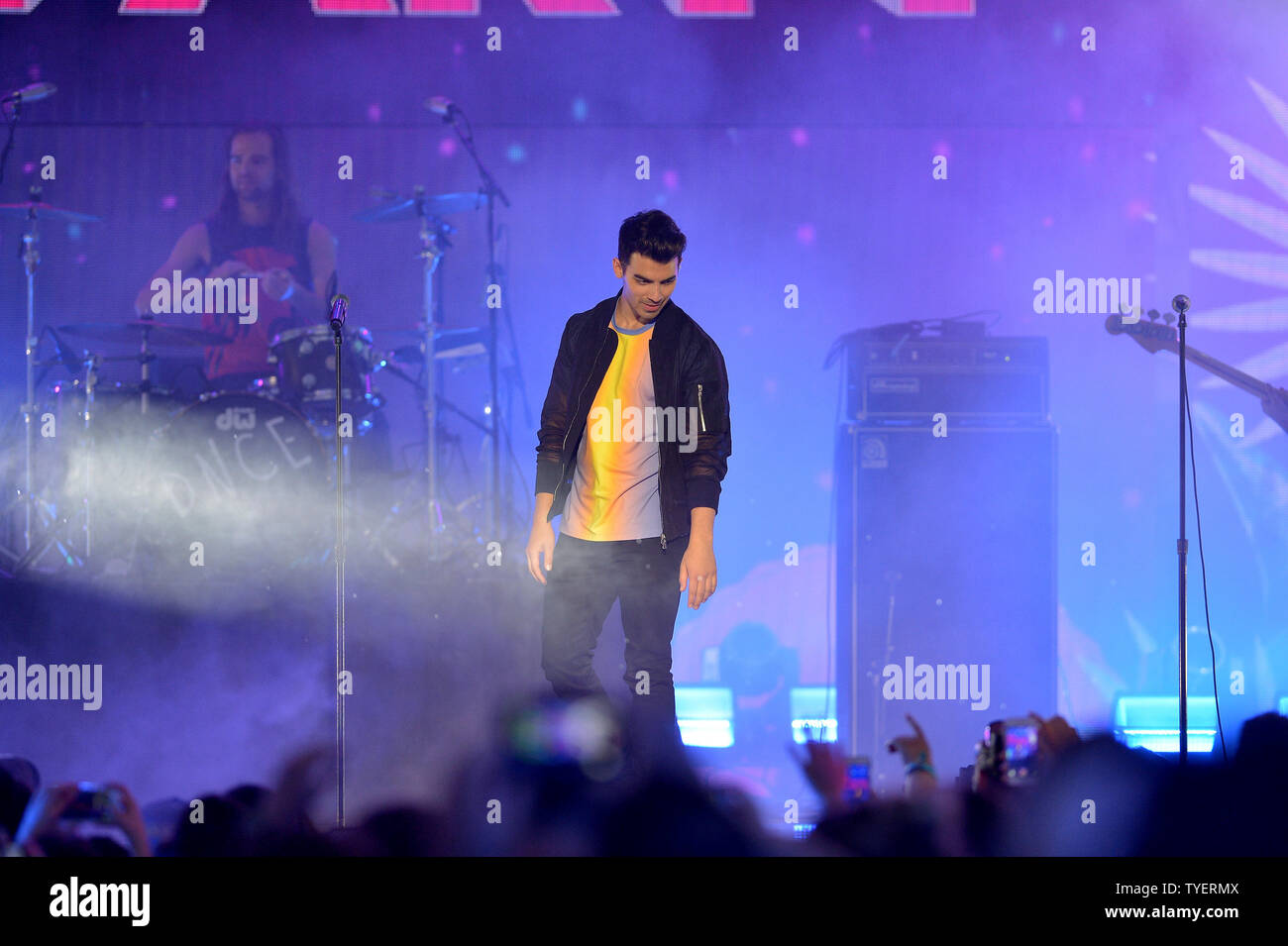 Joe Jonas of DNCE performs at the IHeartRadio Summer Pool Party concert ...