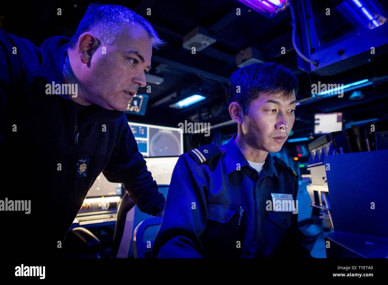 WATERS EAST OF JAPAN (Nov. 4, 2016) Lt.Cmdr. Brian Gauthier, left ...