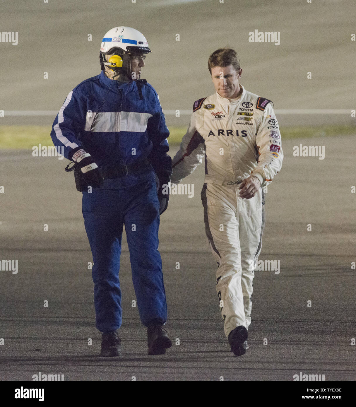 NASCAR Nationwide Series Championship driver Carl Edwards (R) walks on ...