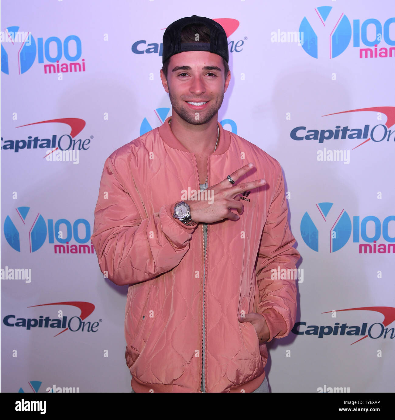 Performer Jake Miller walks the red carpet at the Y100 JingleBall 2016 ...