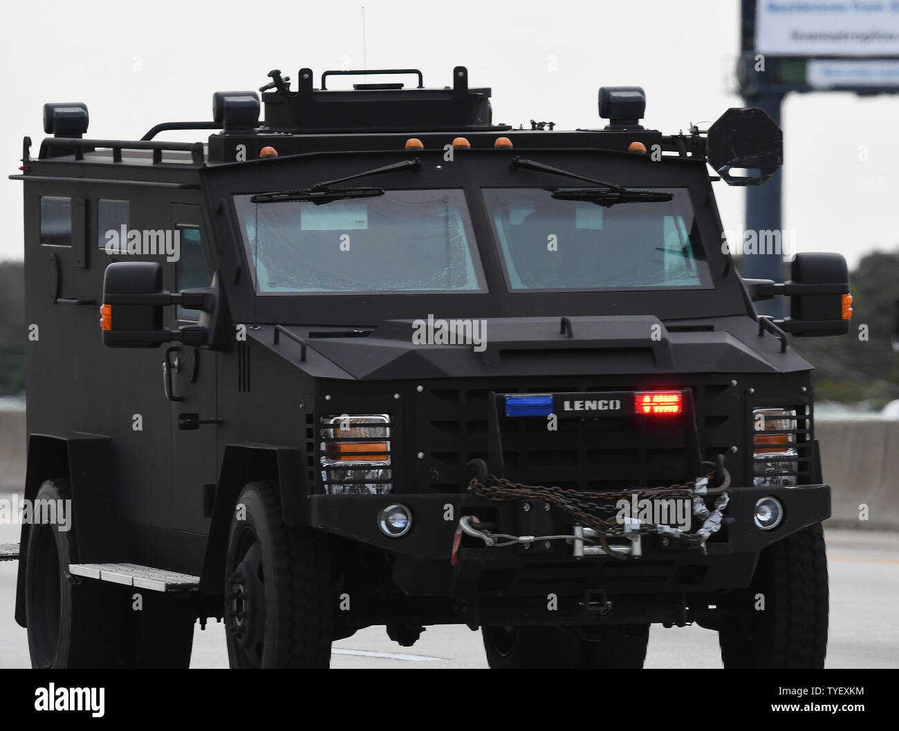 A Florida Sheriff S.W.A.T vehicle heads to Fort Lauderdale airport ...