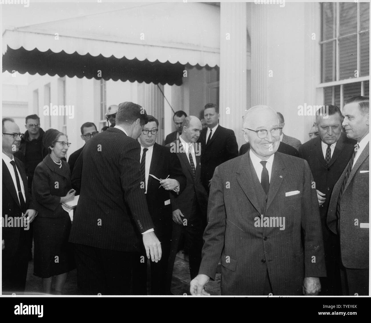 Photograph of former President Harry S. Truman smiling during his visit ...