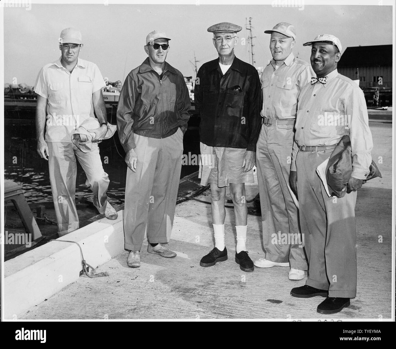Photograph of members of President Truman's vacation party on a fishing ...