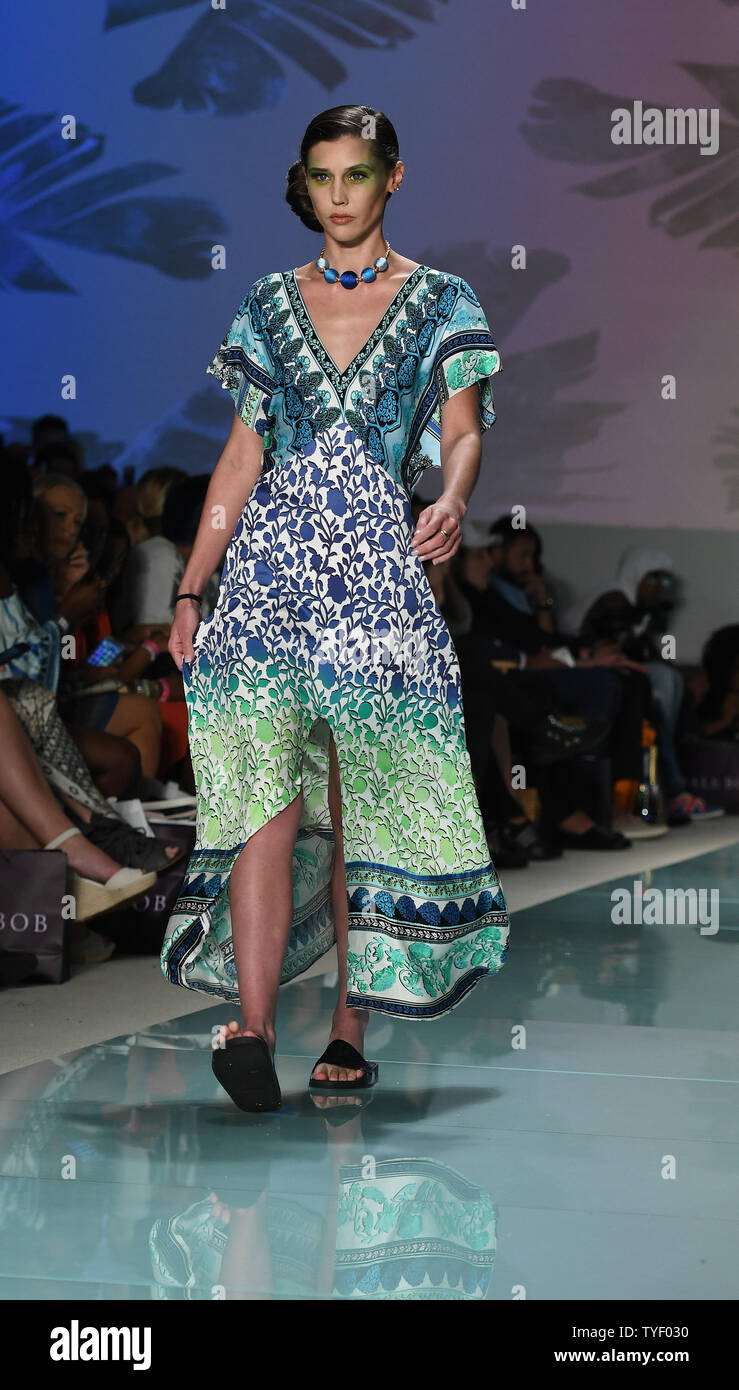 A runway model wears a swimsuit coverup by designer Hale Bob during the ...