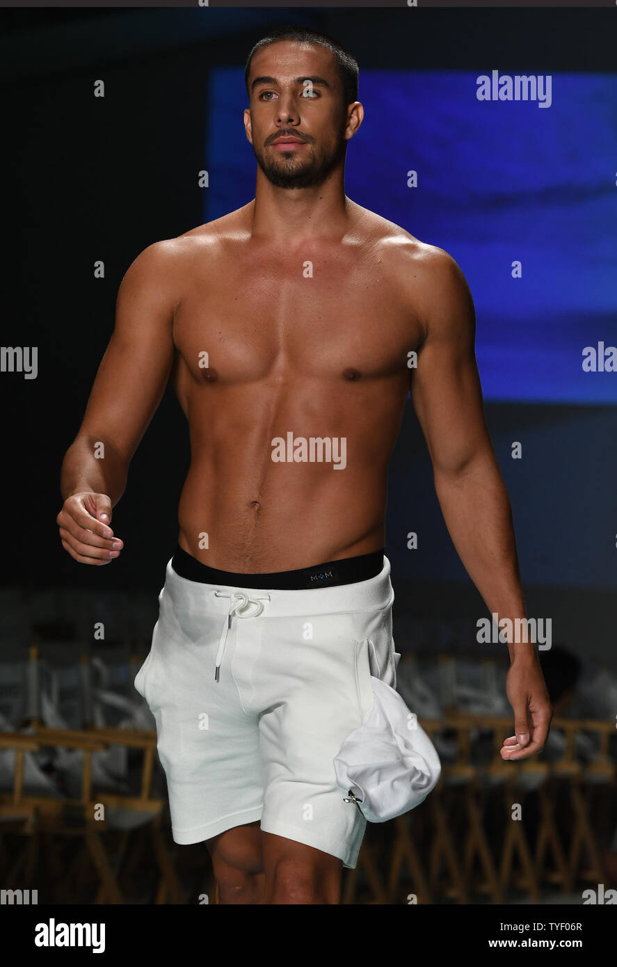 A swimsuit model walks the runway during rehearsals at the Funkshion ...