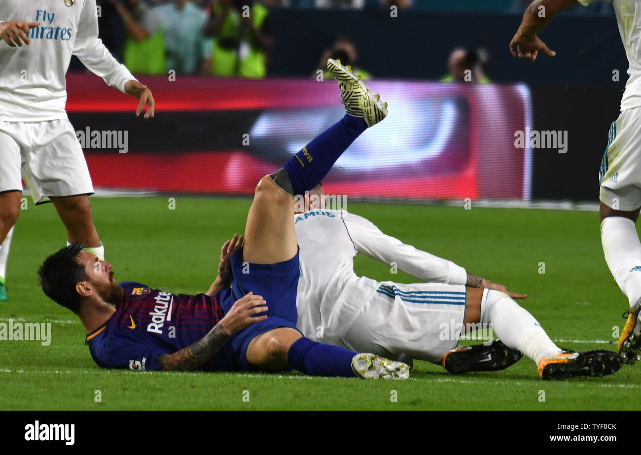 Barcelona's Lionel Messi (10) is tackled in the first half of the El ...