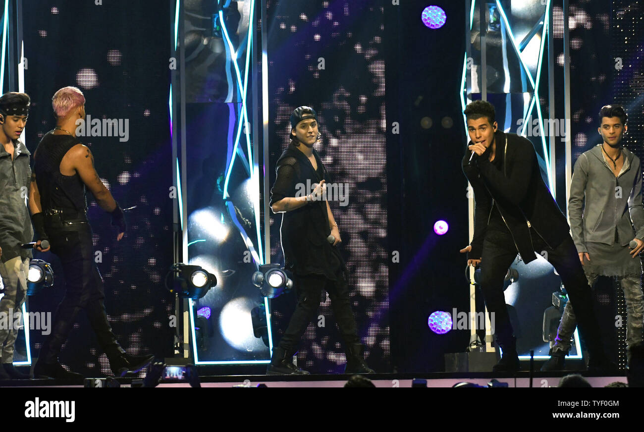 CNCO perform during the 2017 Telemundo Premios Tu Mundo show at the ...