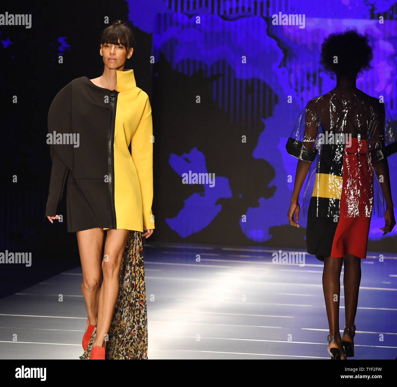 A runway model presents fashions by Raquel Theodoro during Miami ...