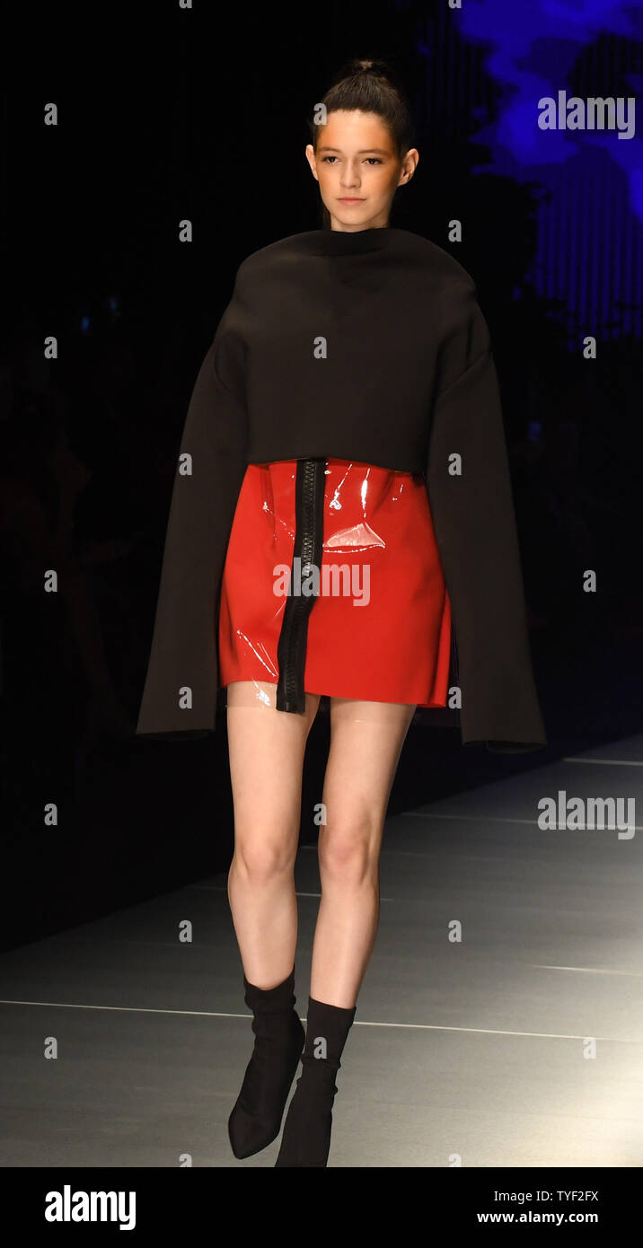 A runway model presents fashions by Raquel Theodoro during Miami ...