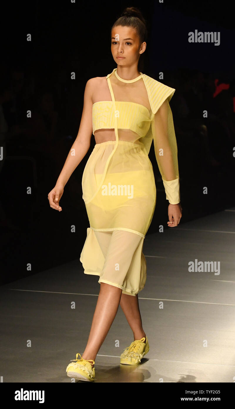 A runway model presents fashions by Beatrice Rose Glover during Miami ...