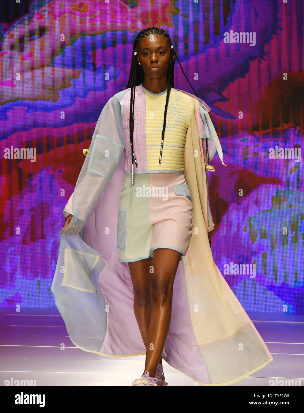 A runway model presents fashions by Beatrice Rose Glover during Miami ...