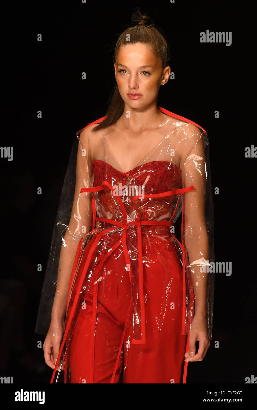 A runway model presents fashions by Yaritza Trinidad during Miami ...