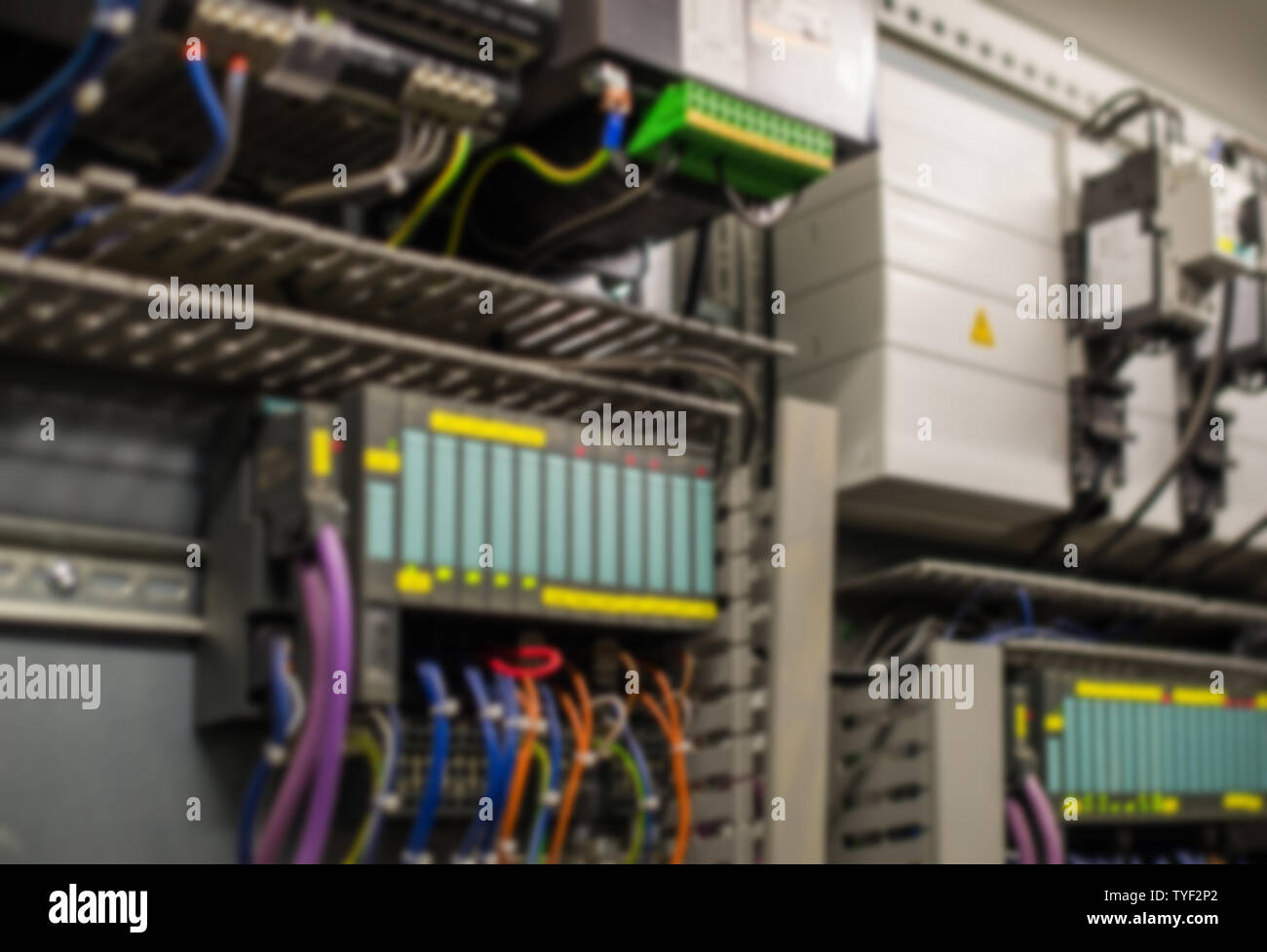 Electric control panel. Blurred engineering background Stock Photo - Alamy