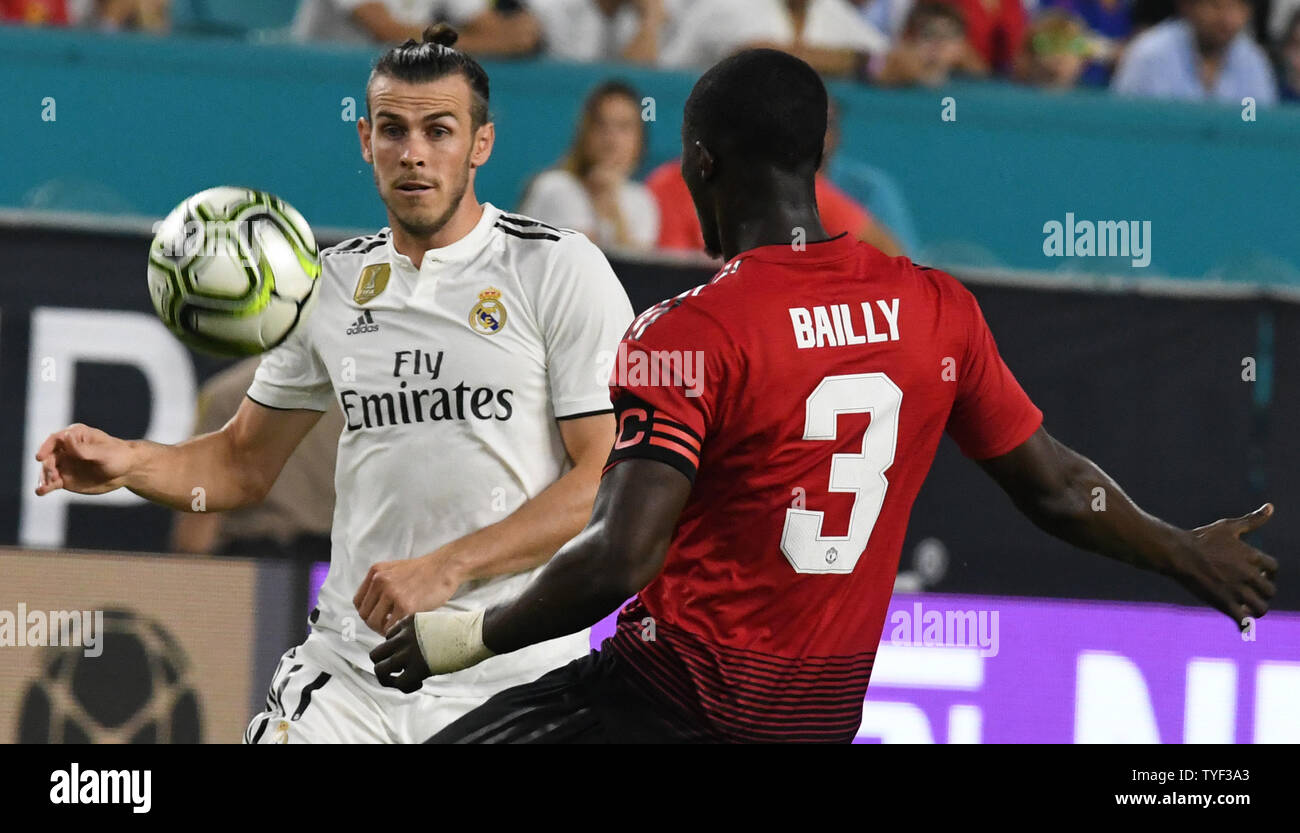 Eric Bailly (3) of Manchester United kicks the ball with Gareth Bale ...