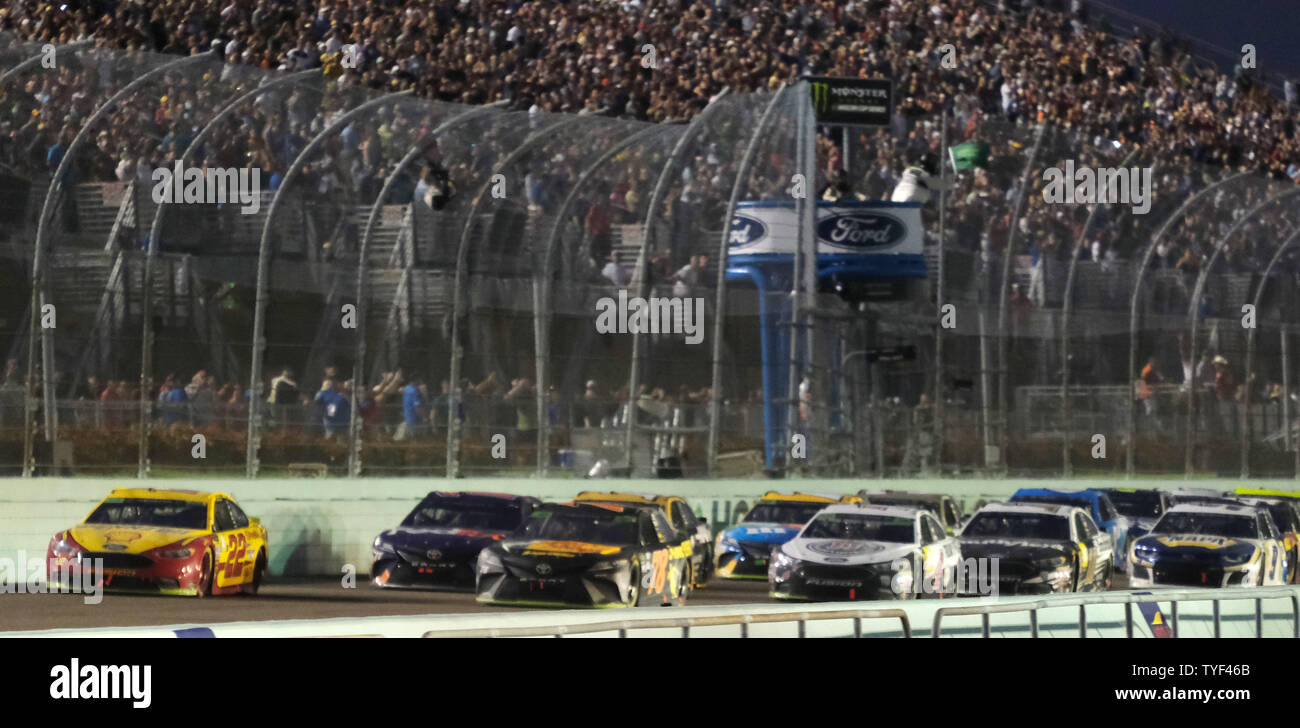 Joey Logano (22) leading the pack during a race restart in the NASCAR ...