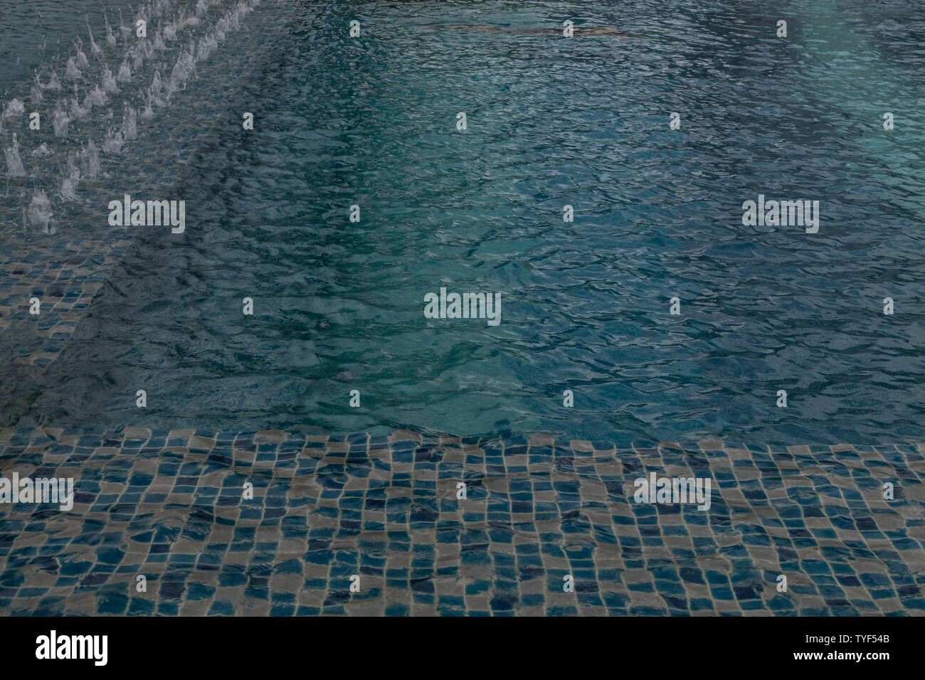 Blue water swimming pool in summer season, Outdoor swimming pool Stock ...