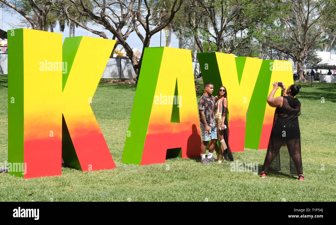 Rasta fans pose for a photo at the KAYA music fest at Bayfront park in ...