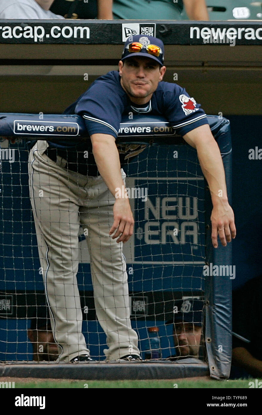 San Diego Padres' Brian Giles stands in the dugout during the ninth ...