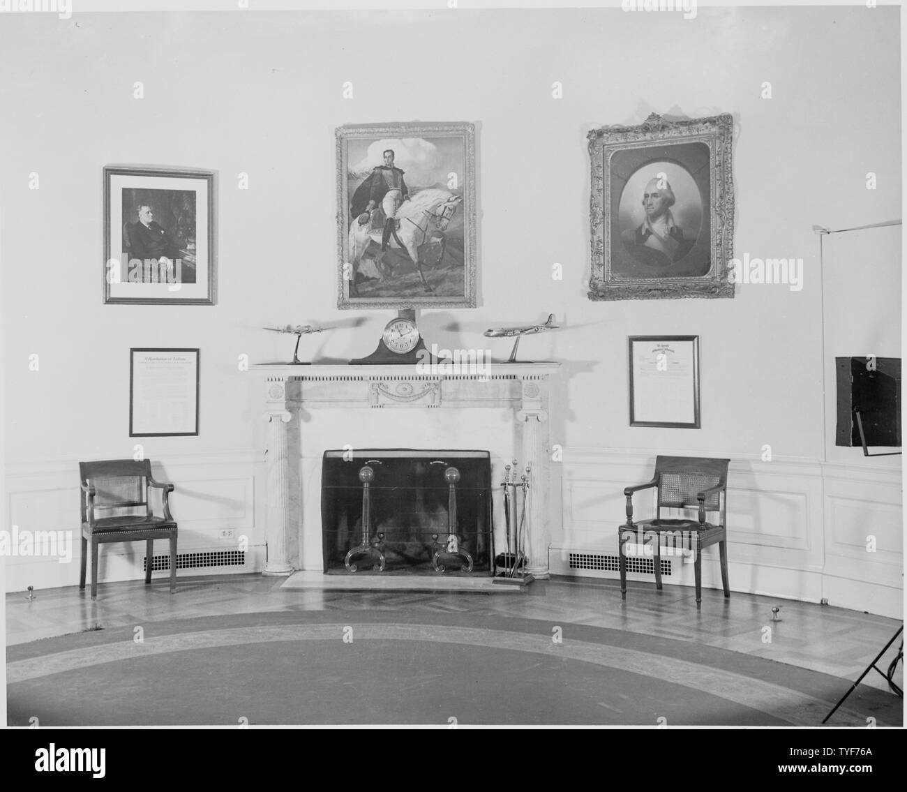 Photograph of the fireplace in the Oval Office at the White House, with ...