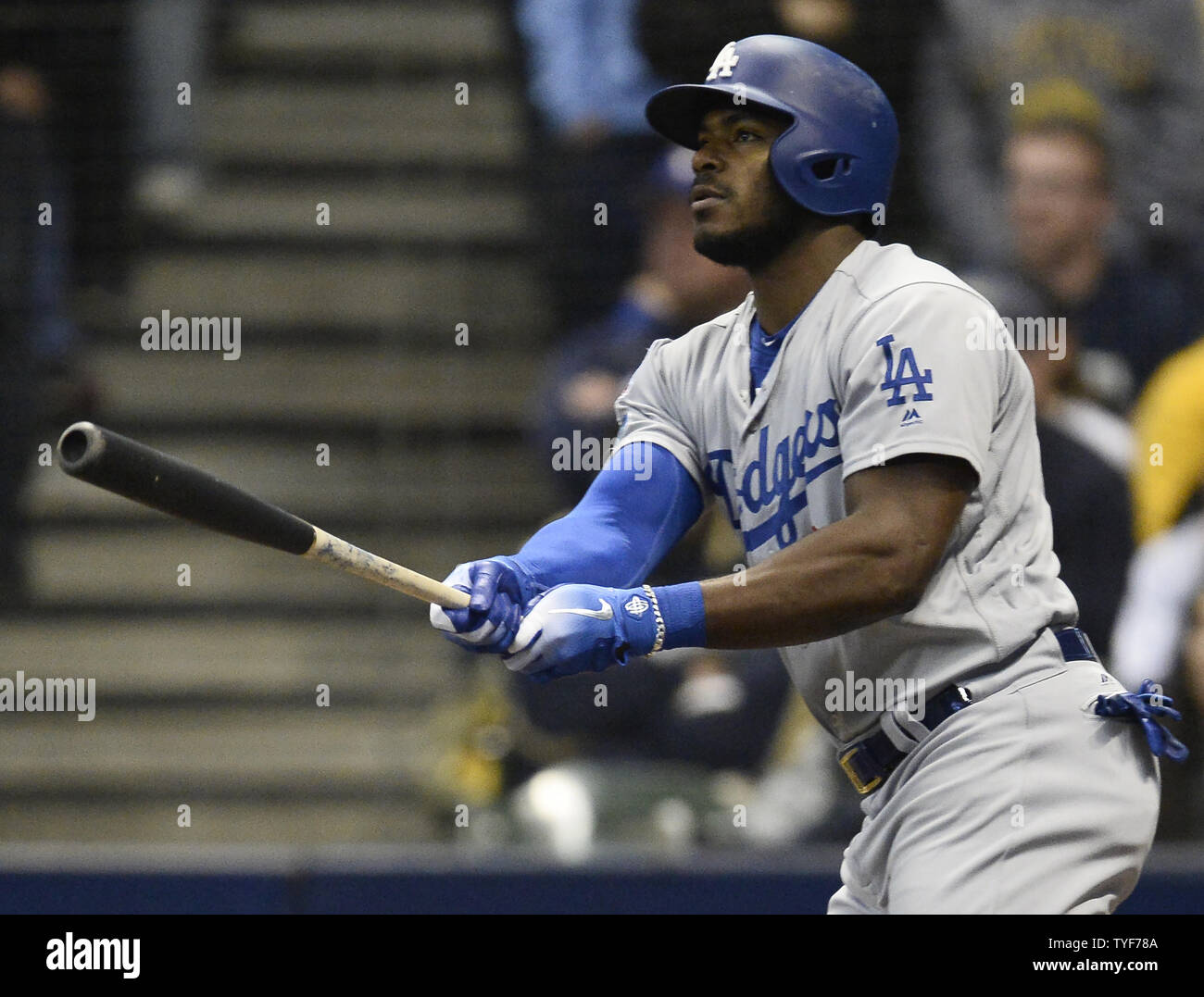 Los Angeles Dodgers right fielder Yasiel Puig hits a three-run home run ...