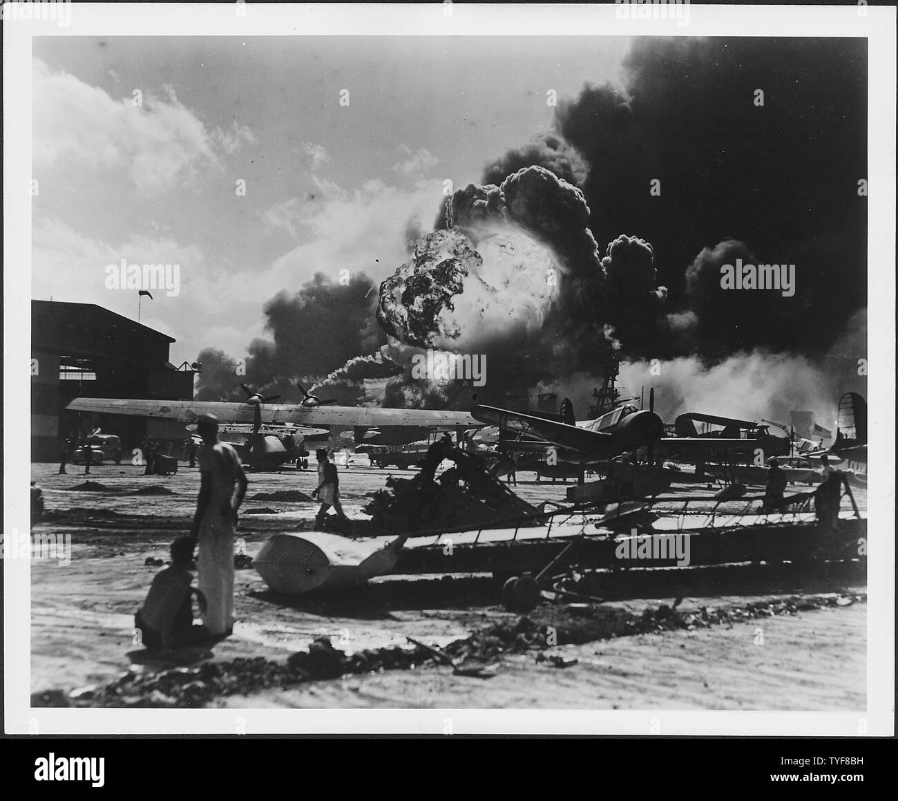 Photograph of the wreckage-strewn Naval Air Station at Pearl Harbor ...