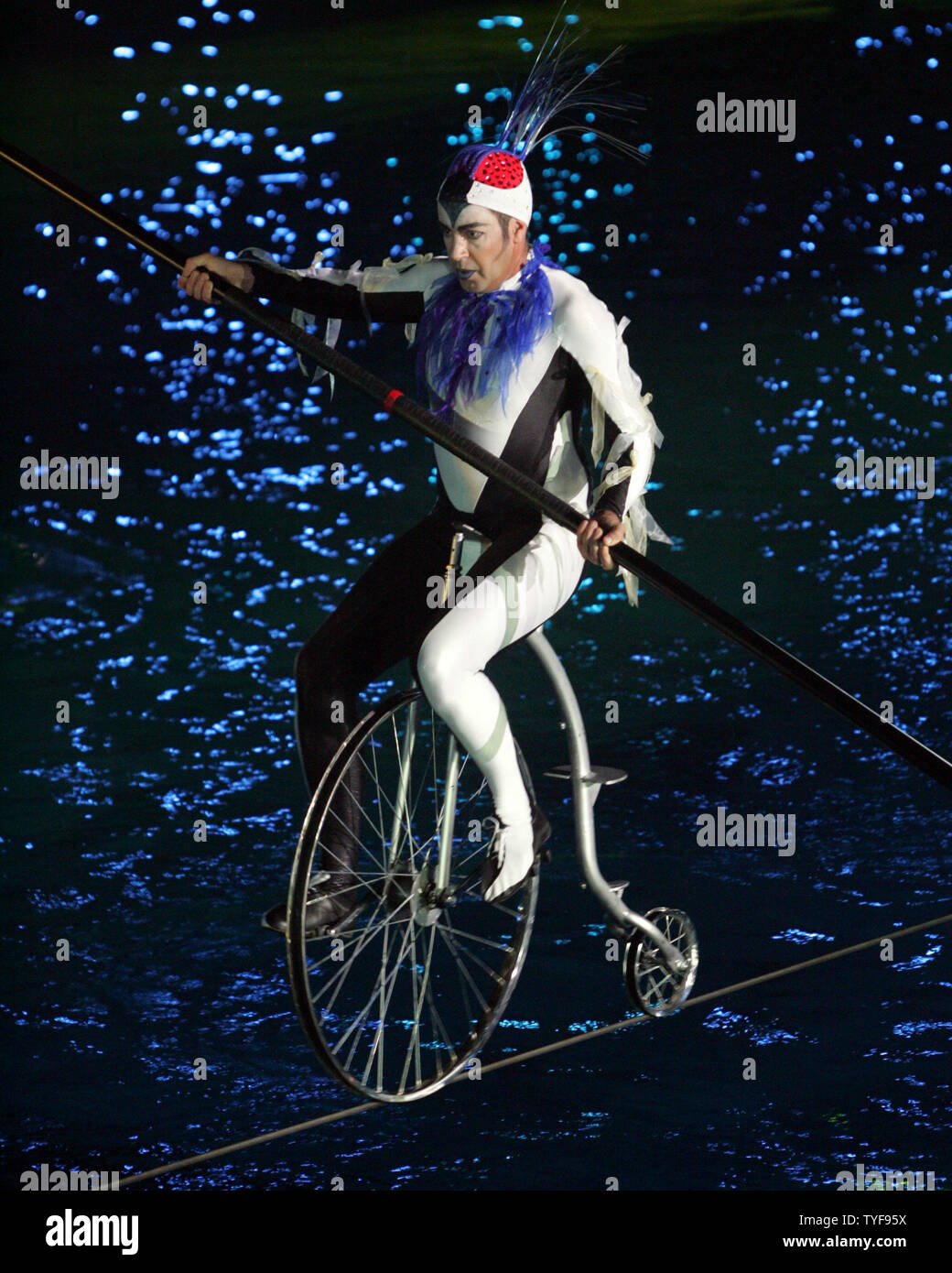 A tightrope artist performs in the opening ceremonies of the XI FINA ...
