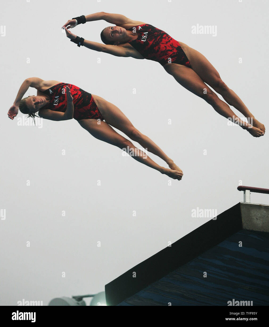 American divers Laura Wilkinson (right) and Cassandra Cardinell perform ...
