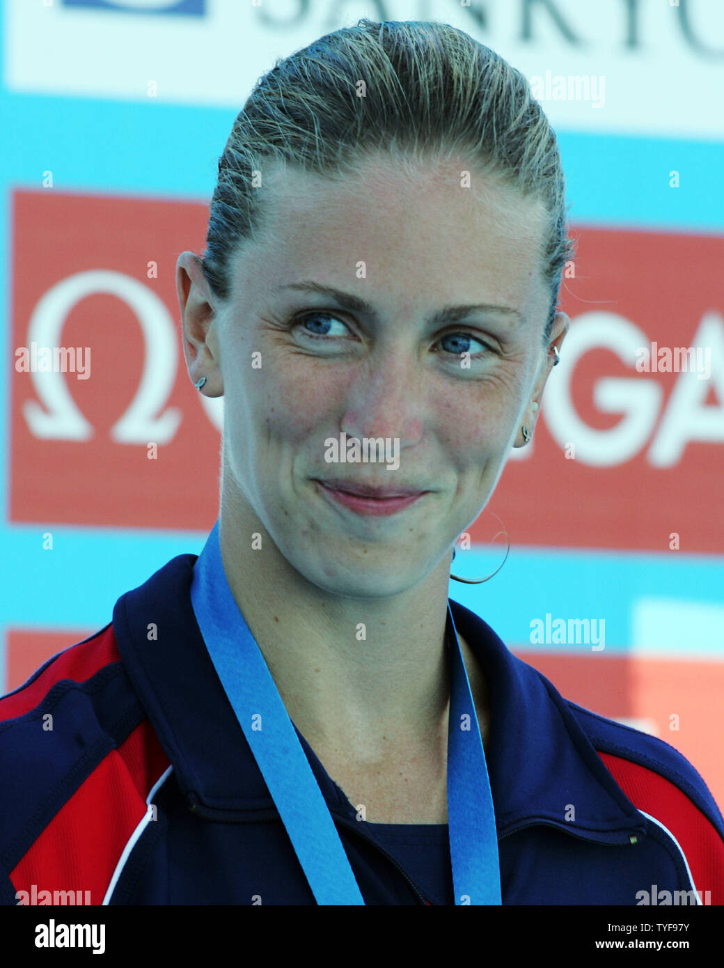 American diver Laura Wilkinson, of Spring, Tex., beams after collecting ...